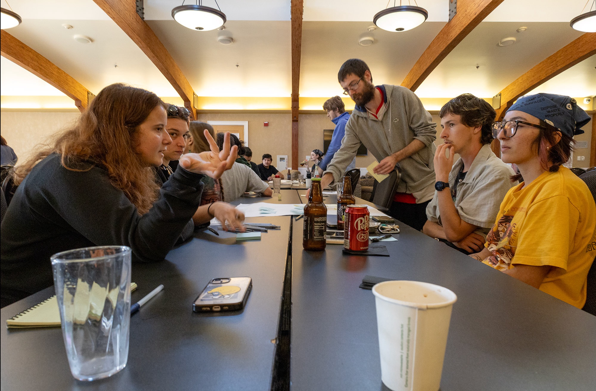 A group of students discus their thoughts and concerns on Time Place ...